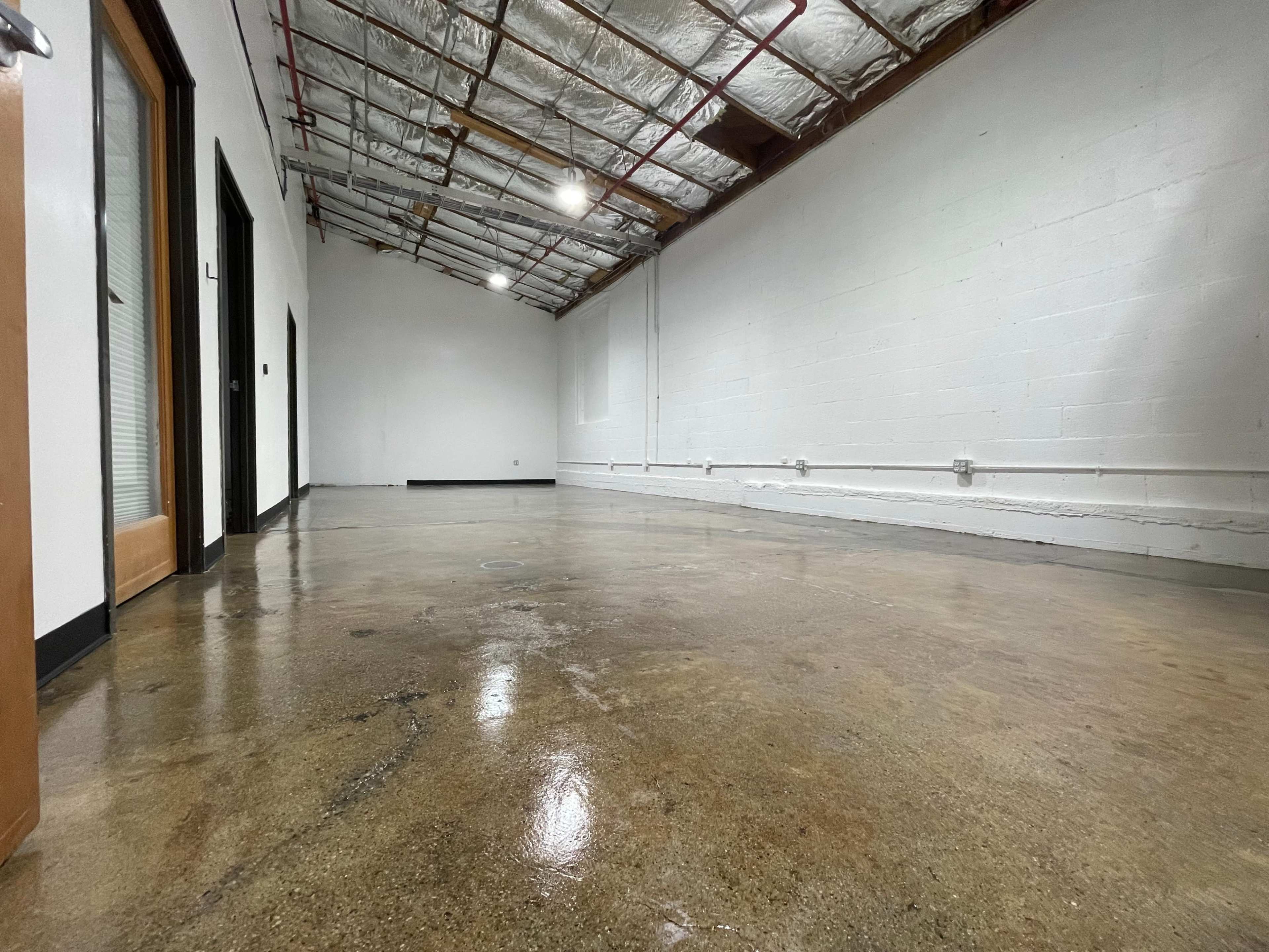 Bright, Open Photo/Video Studio with White Brick Wall and High Ceilings ...