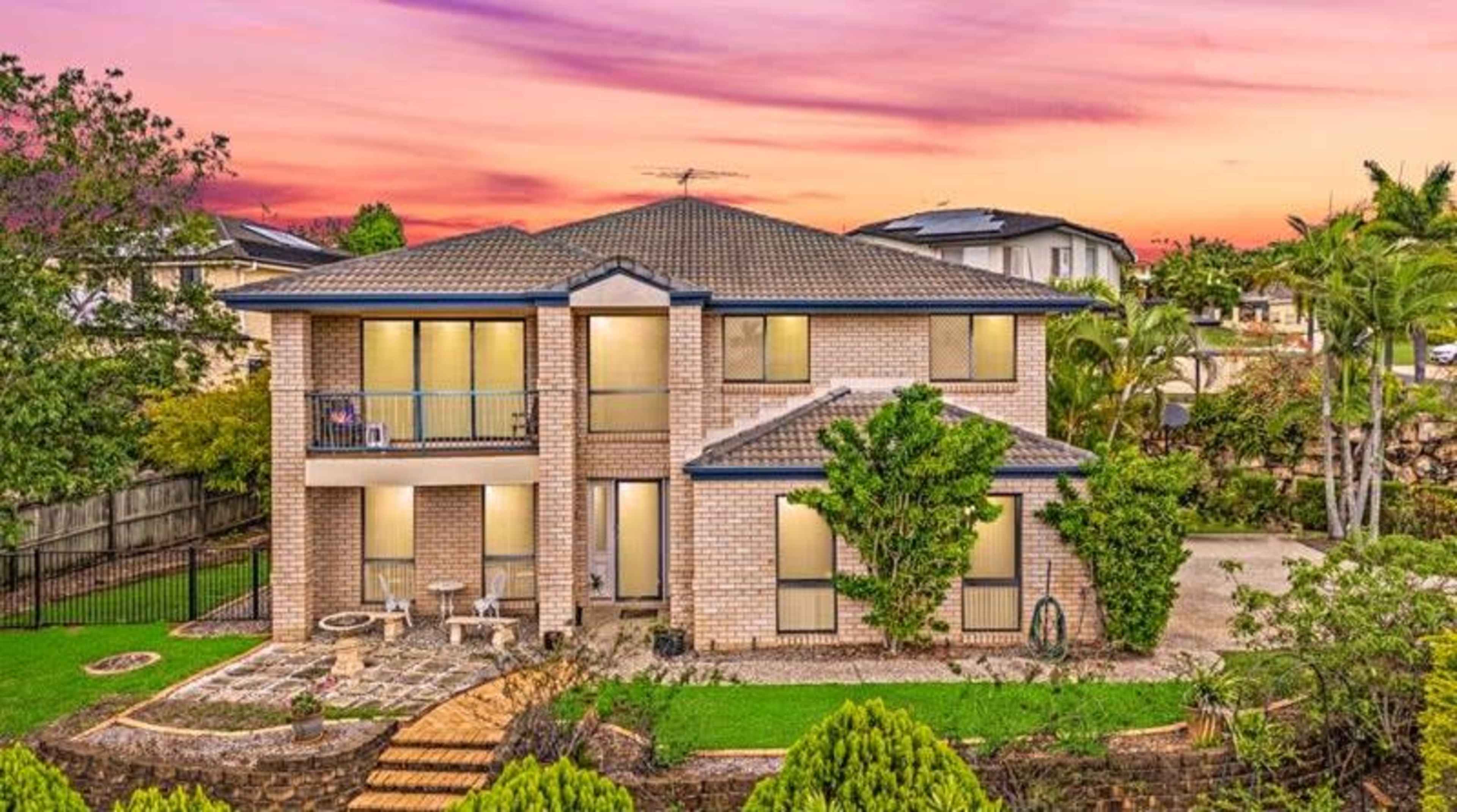 double-storey brick house with beautifully landscaped gardens, Albany ...