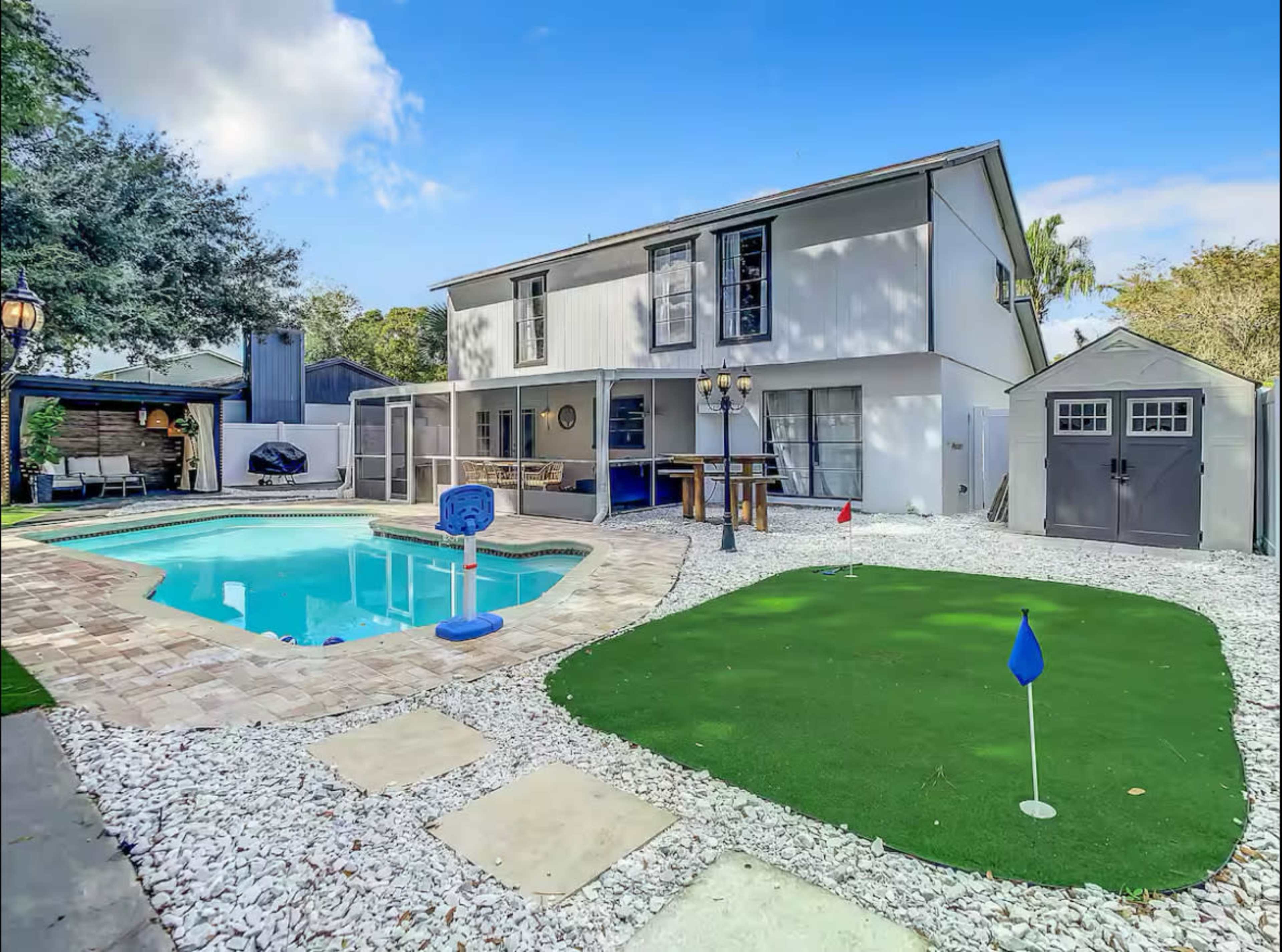 Sunny retreat pool and mini golf | The Luxe backyard escape, Tampa, FL | Off-Site | Peerspace