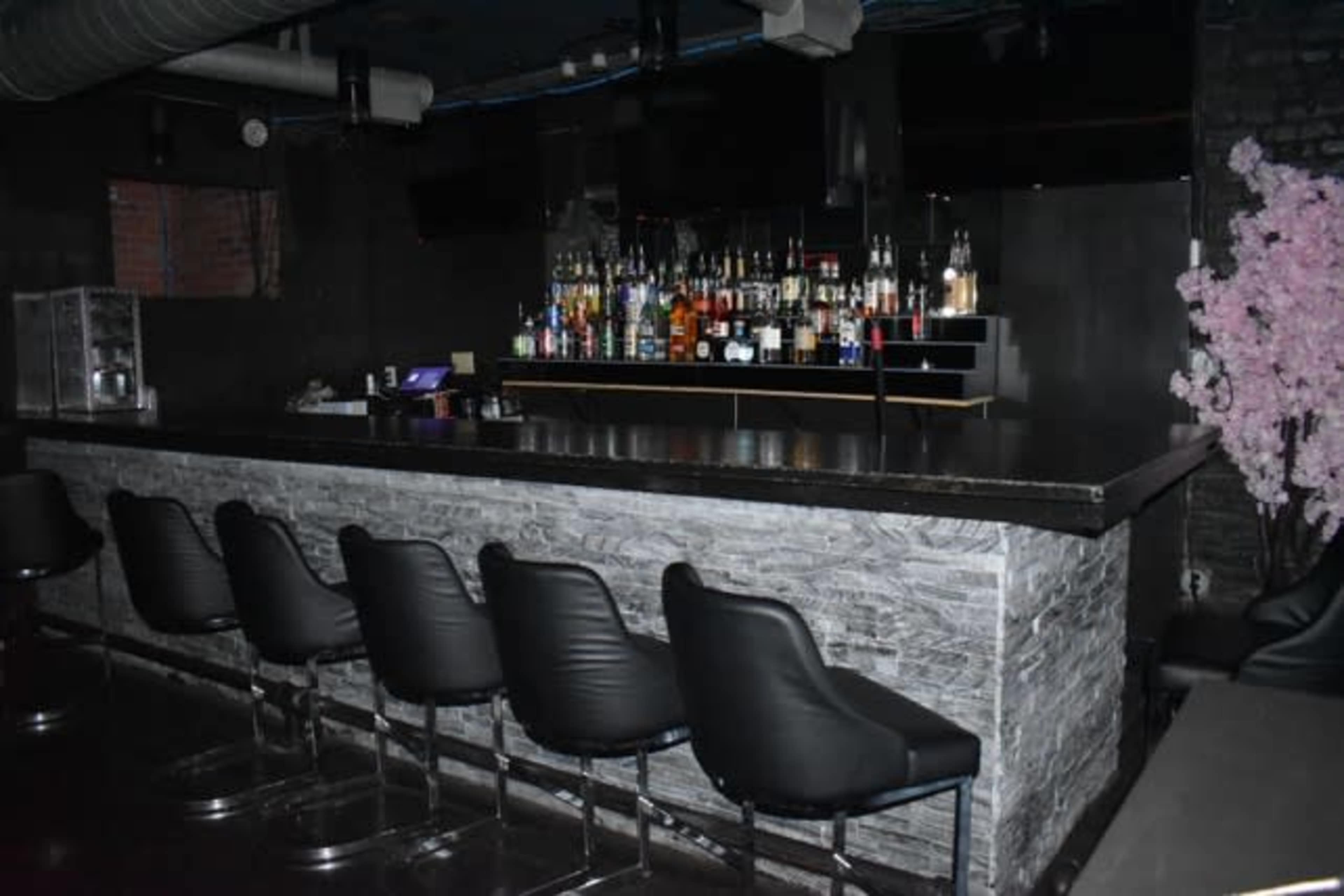 DC themed inspired two level lounge event venue with full bar on each ...