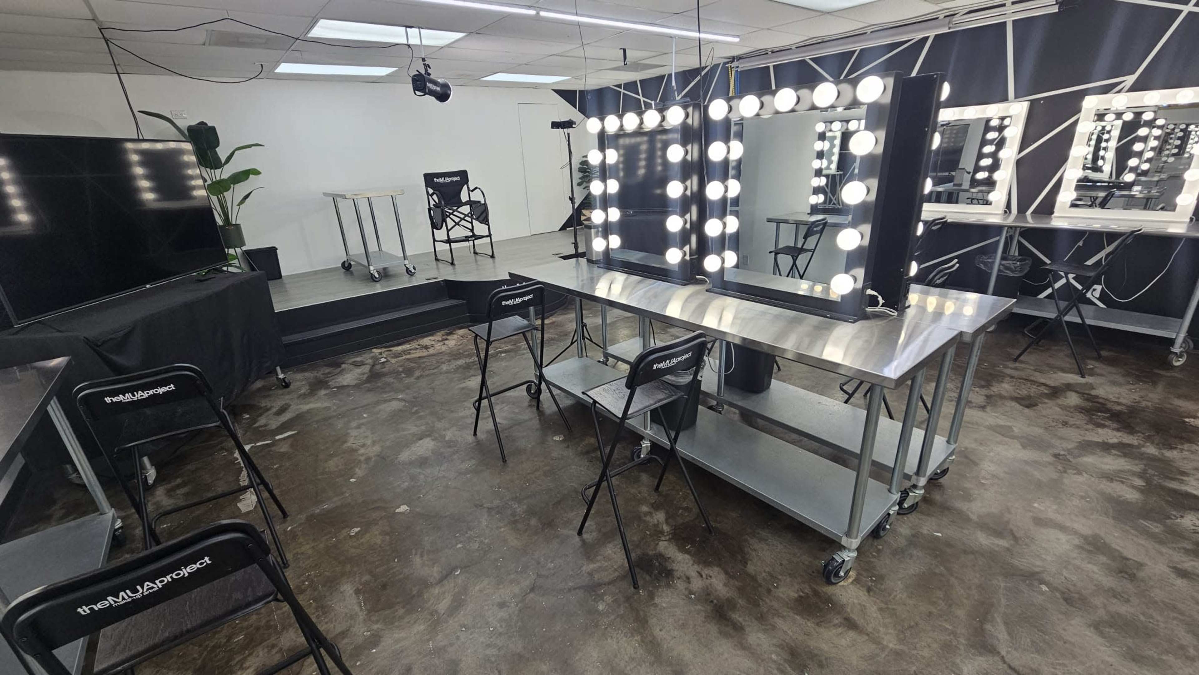 theMUAproject | Clean, bright, open studio or classroom with Hollywood Vanities and barstool ...