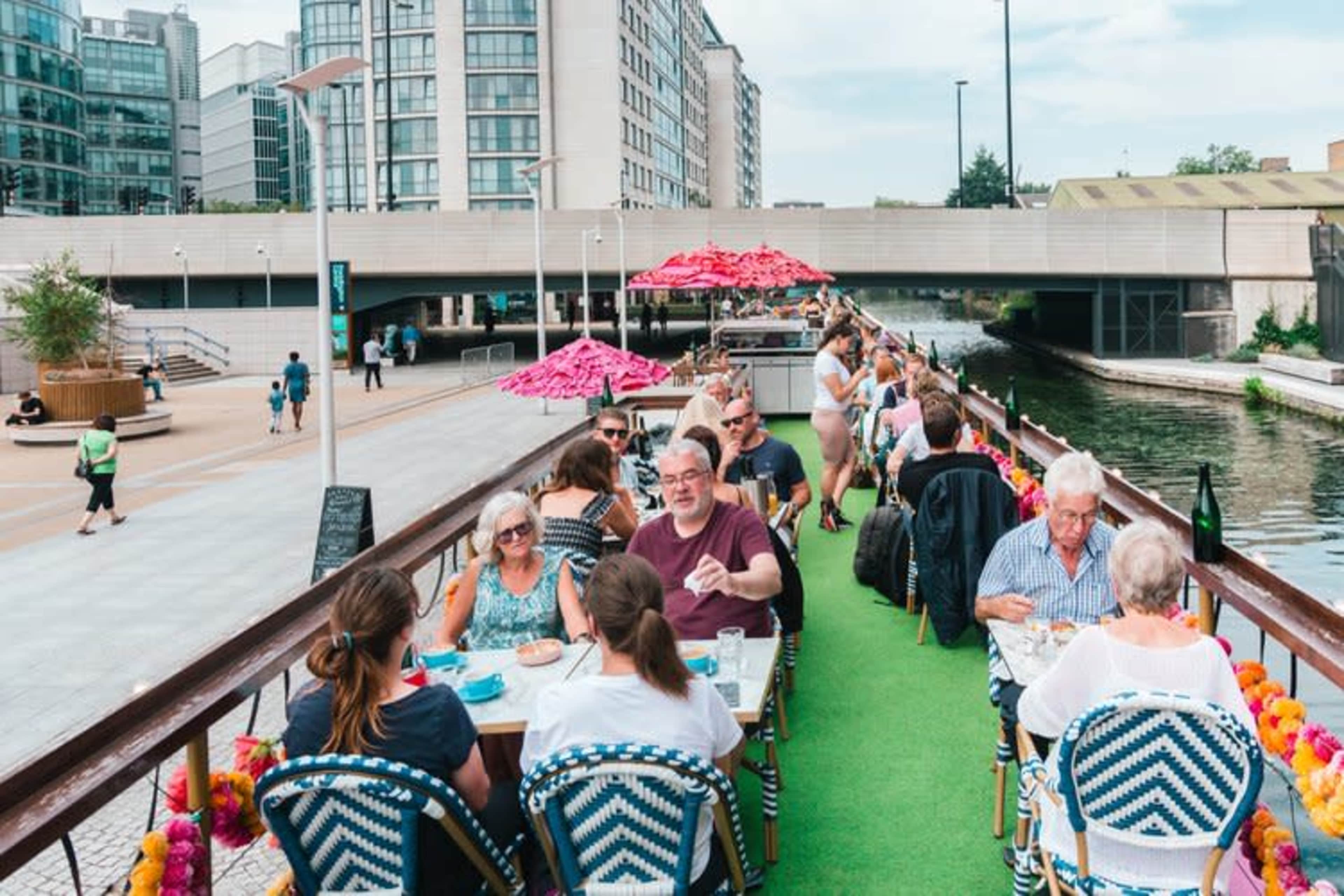 Colourful barge restaurant on the Paddington canal, Paddington Central ...