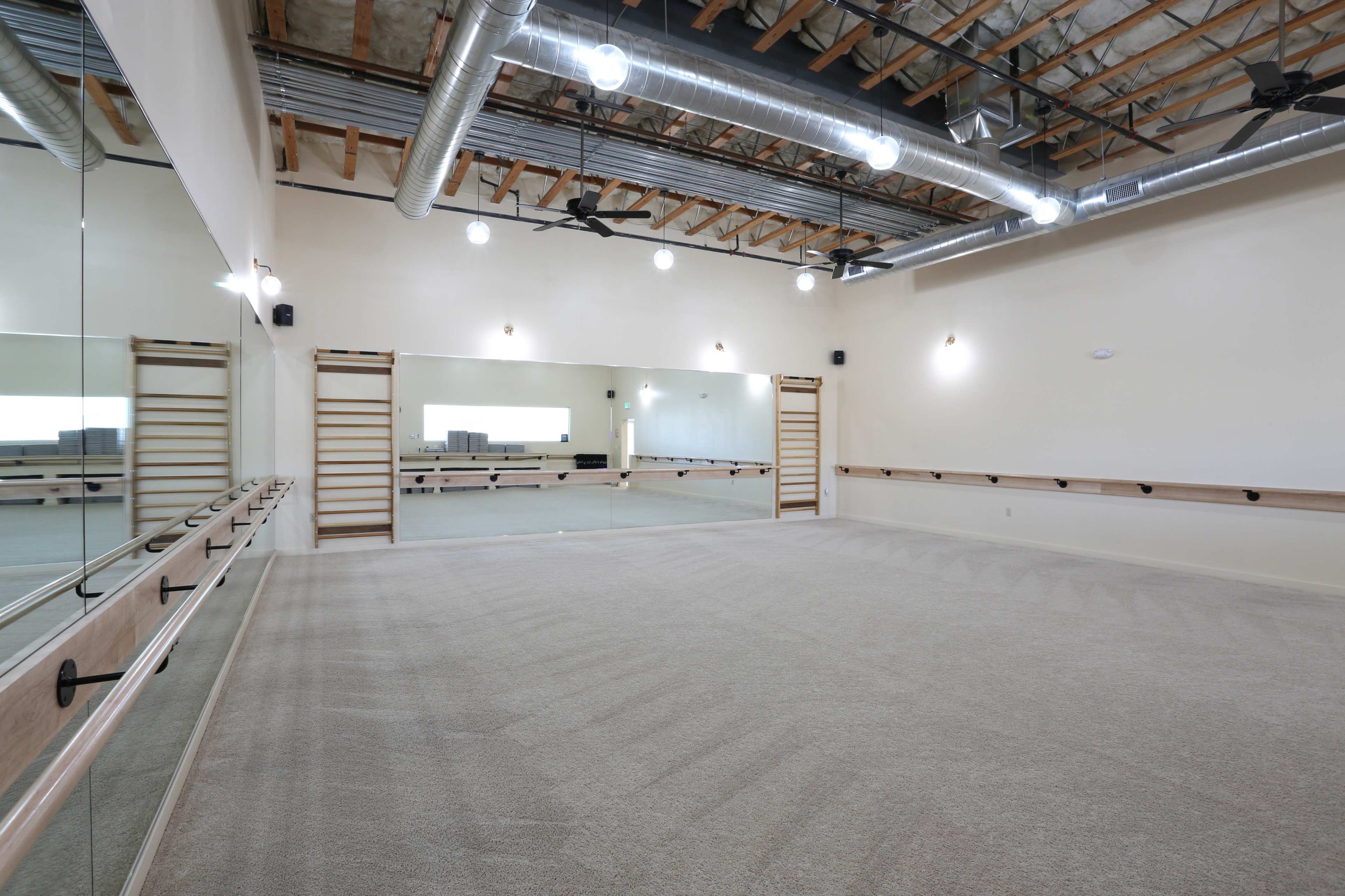 The Bar Method | Fitness/Dance Studio with Carpet and Ballet Barres ...