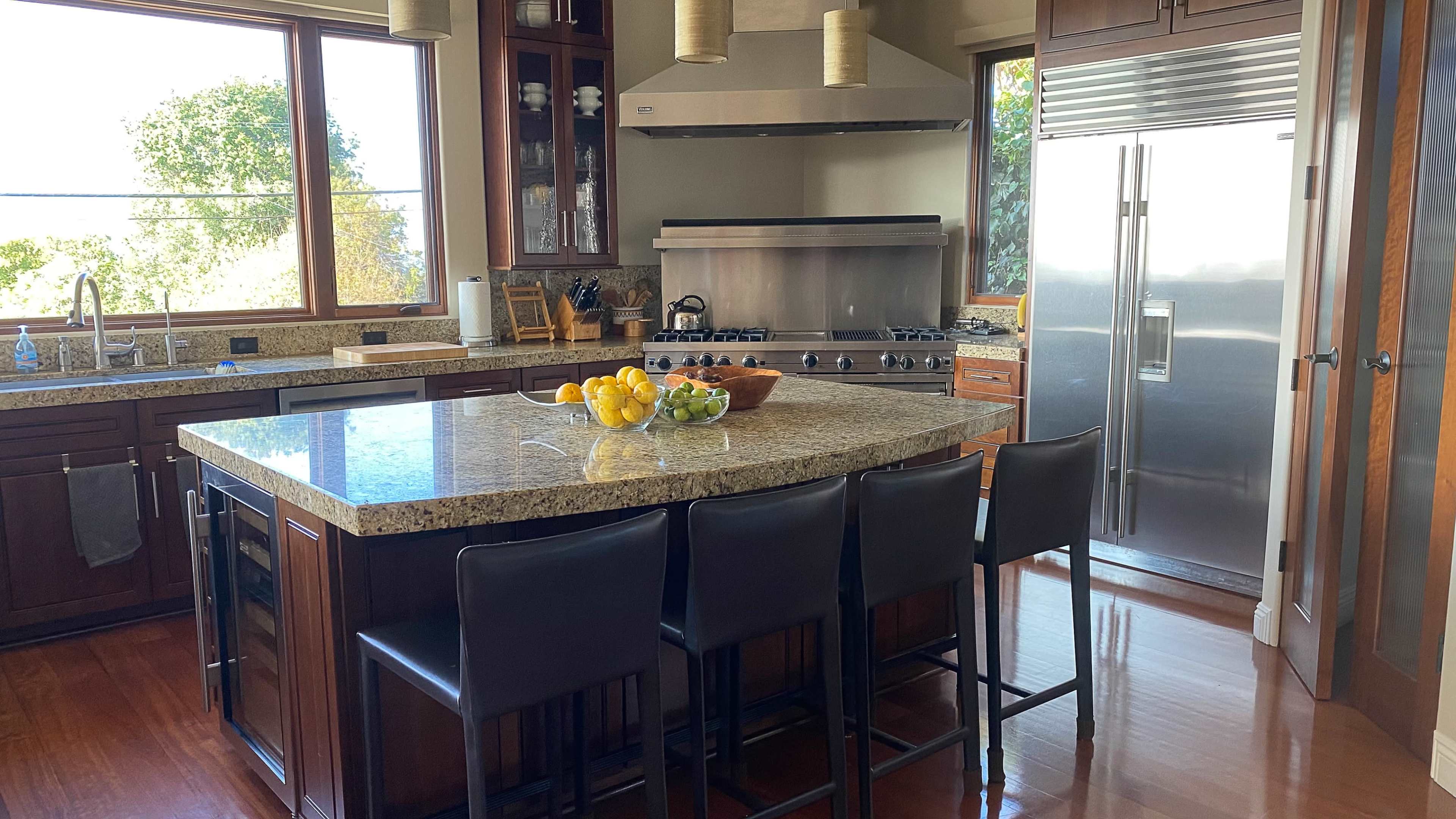 Elegant, contemporary home with large living spaces, dens and a chef's ...