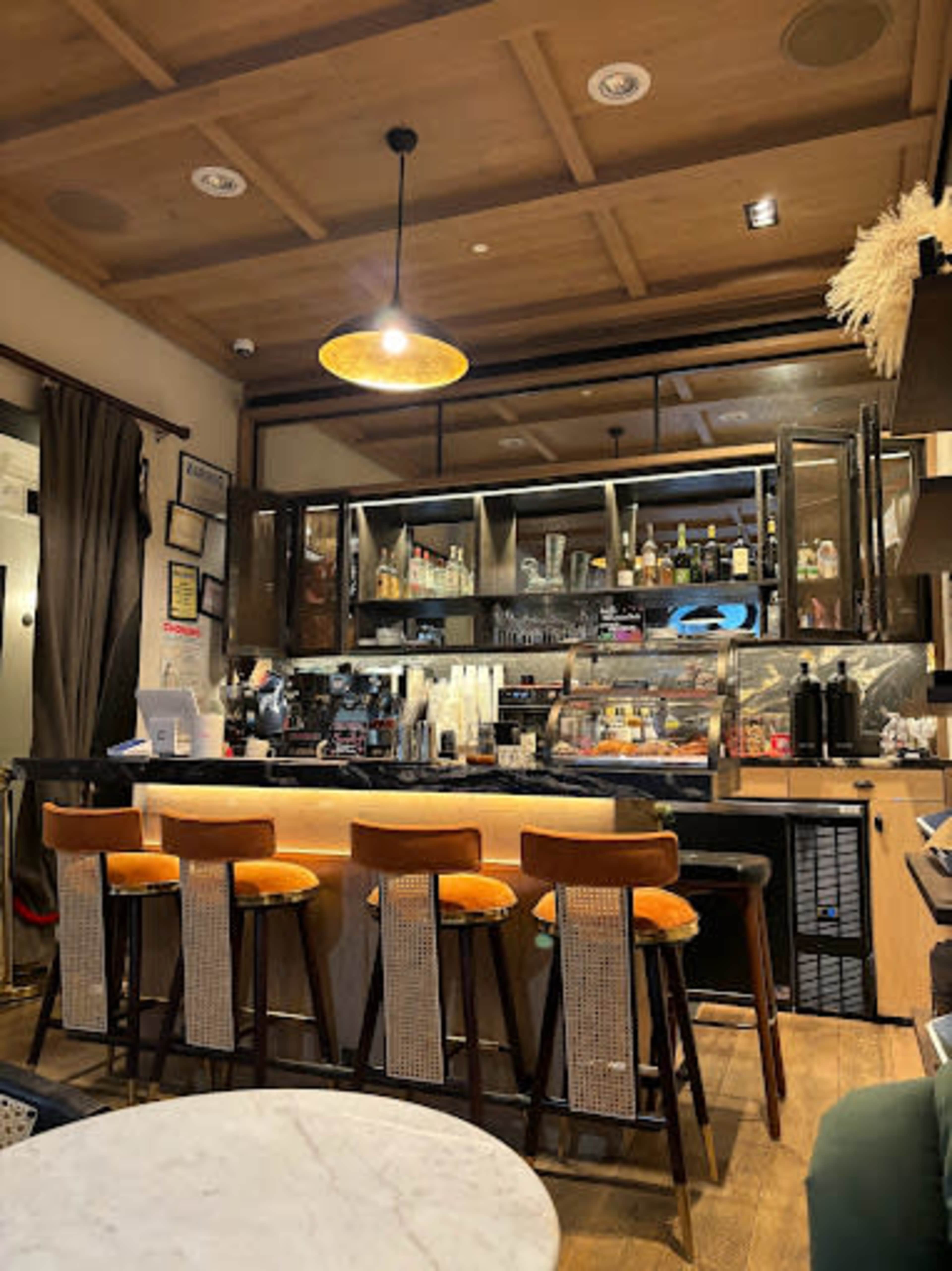 Chic Manhattan Café with Cozy Mini Bar & Catering Options, New York, NY ...