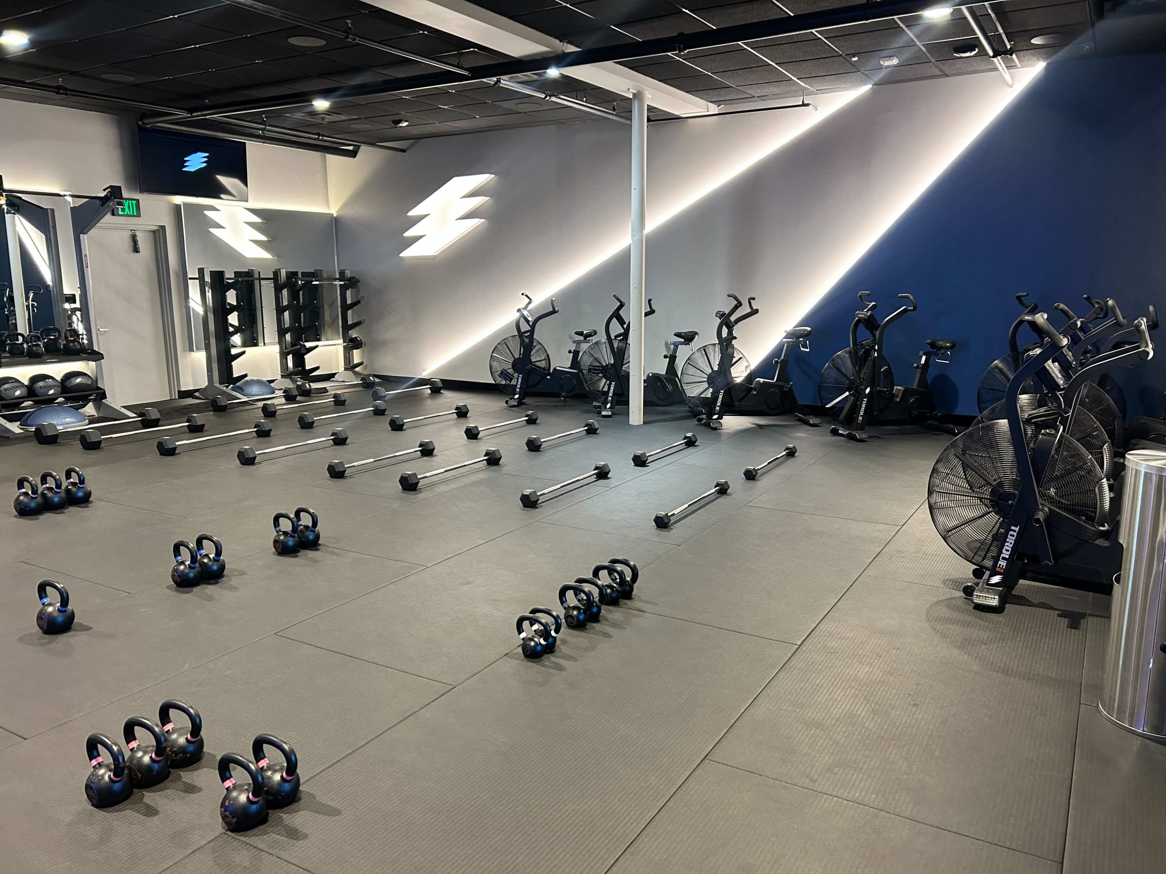 Modern High-Energy Fitness Studio with Sleek Design & Lighting in ...
