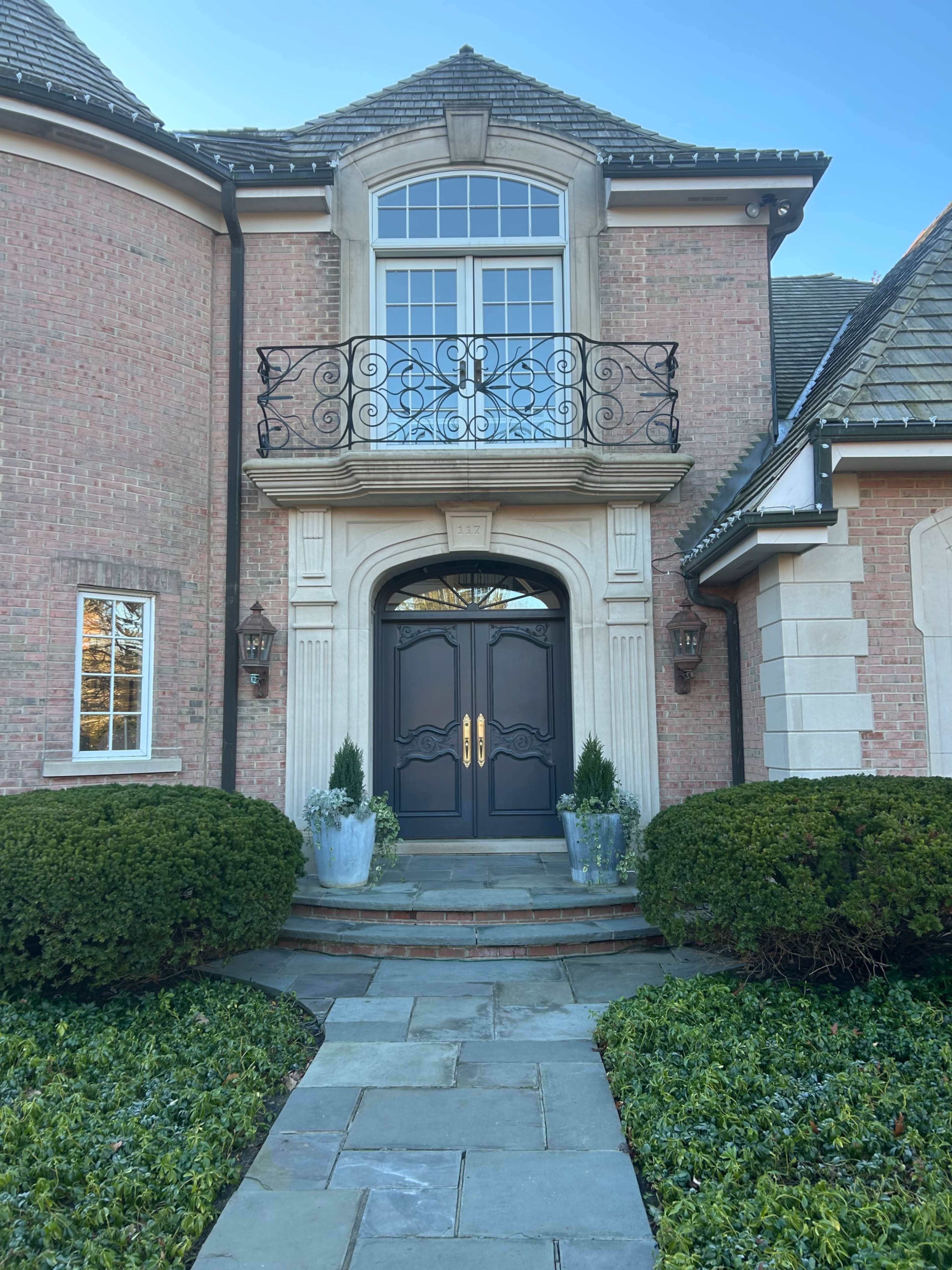 Large suburban home with unique, traditional architecture and leafy ...