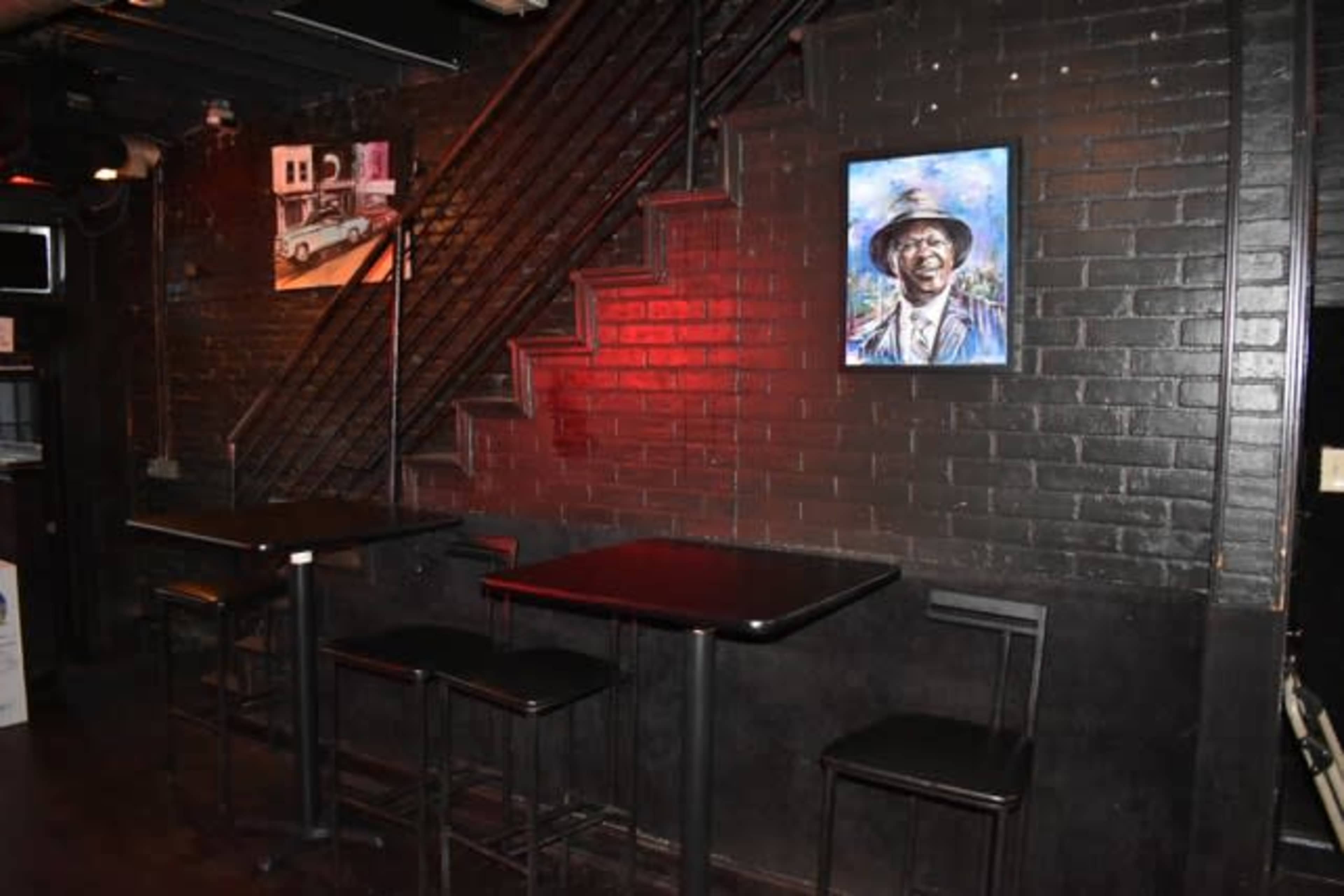 DC themed inspired two level lounge event venue with full bar on each ...