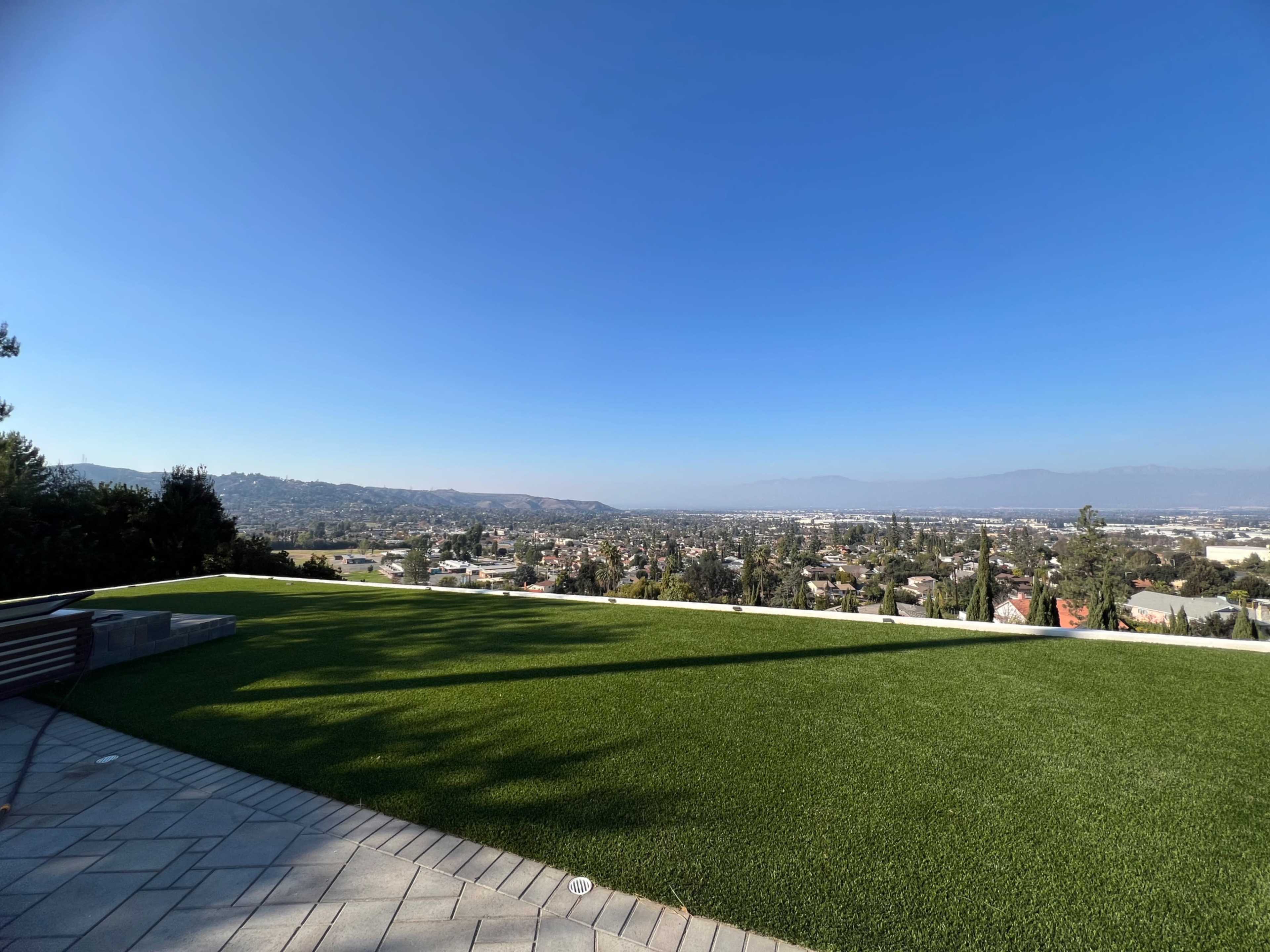 Peaceful and Scenic Neighborhood Backyard Backdrop with a City/Mountain ...