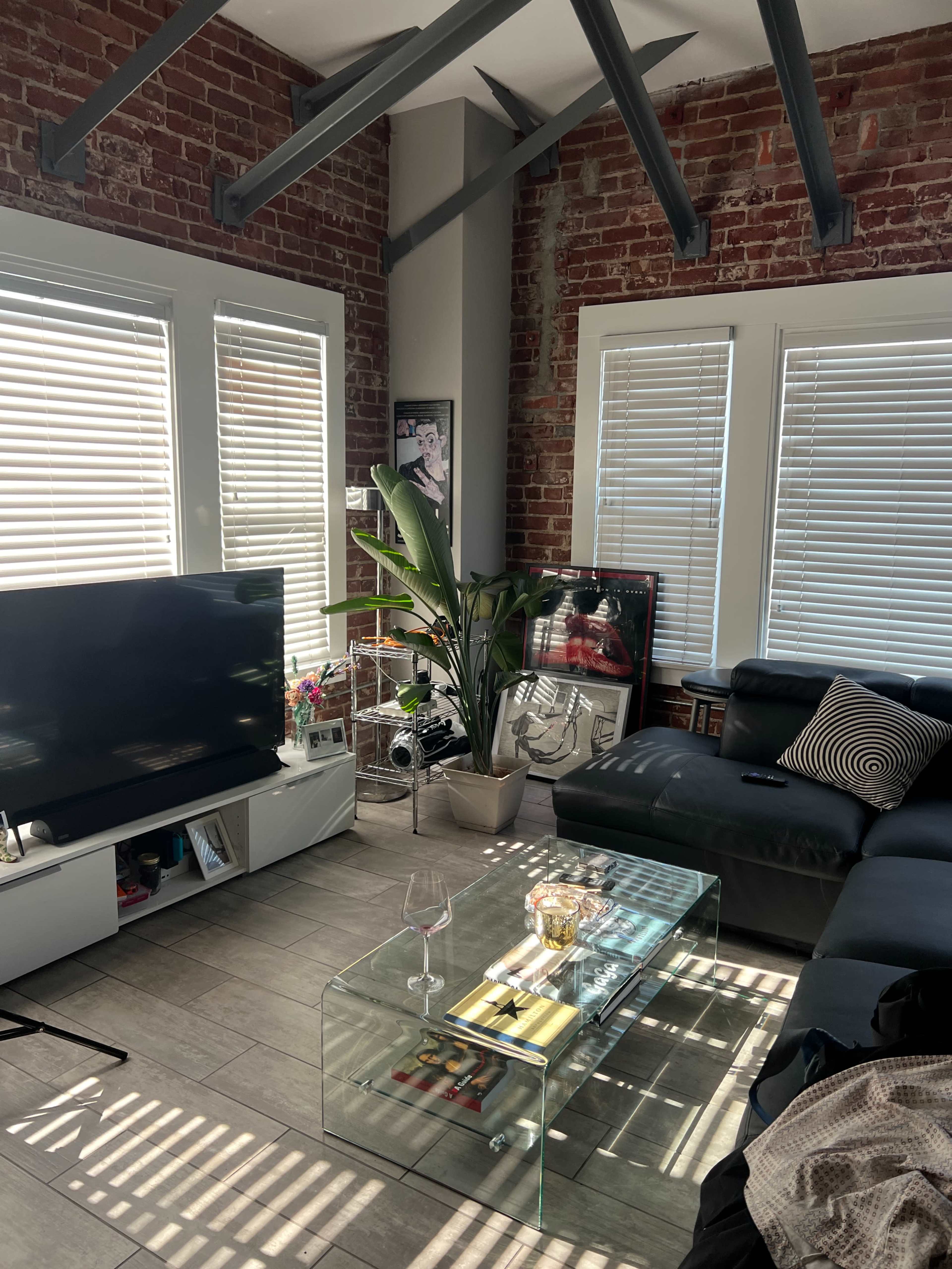 Urban Daylight Studio with Exposed Brick and Views of Melrose, Los ...