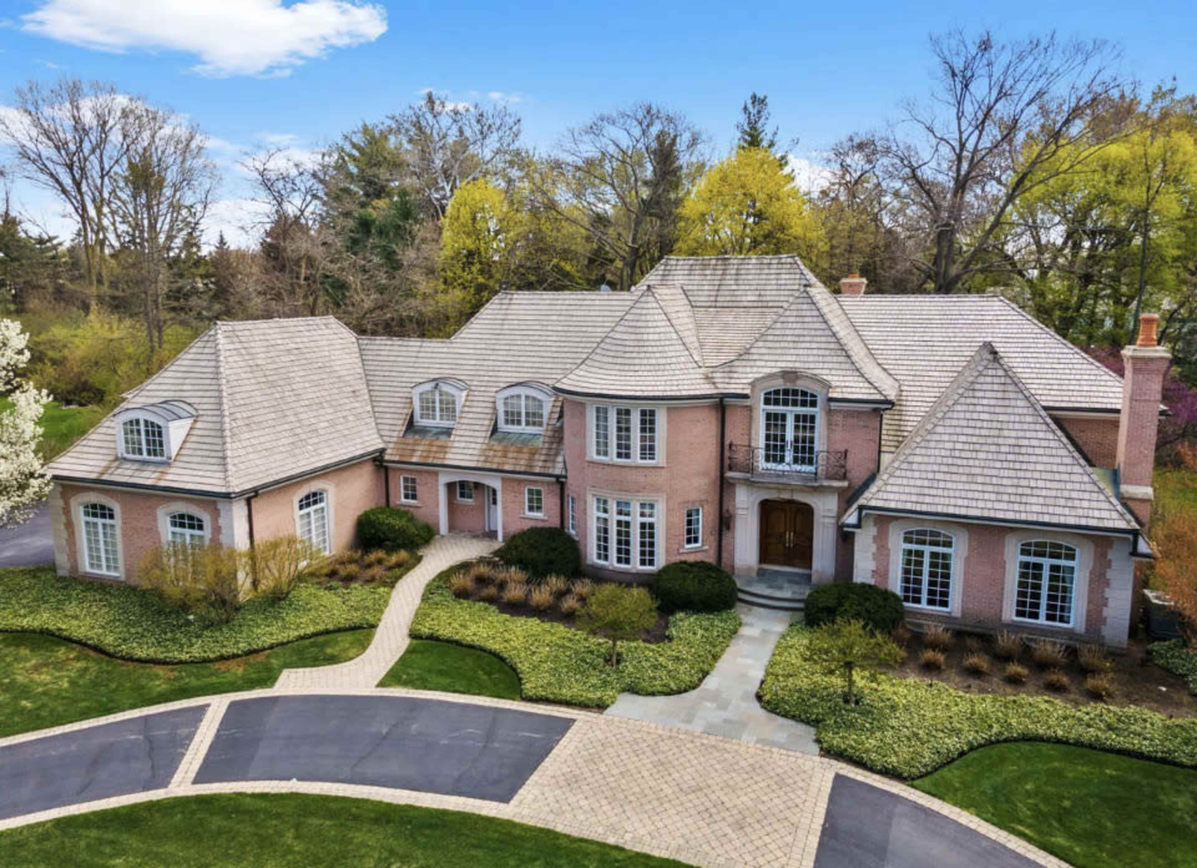 Large suburban home with unique, traditional architecture and leafy ...