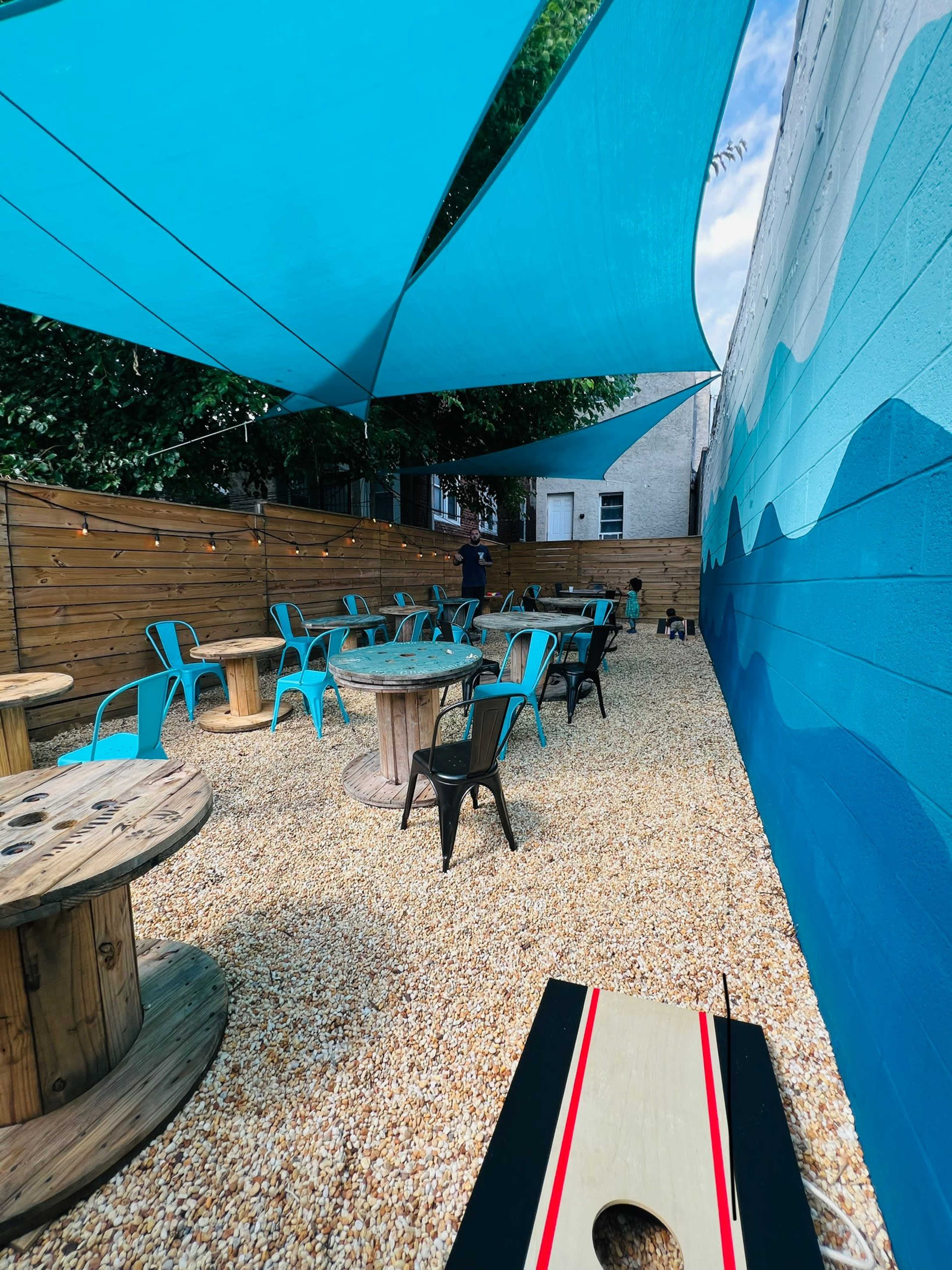 Wavy Open Air Event Space | Open-Air Space with Artistic Mural Wall ...