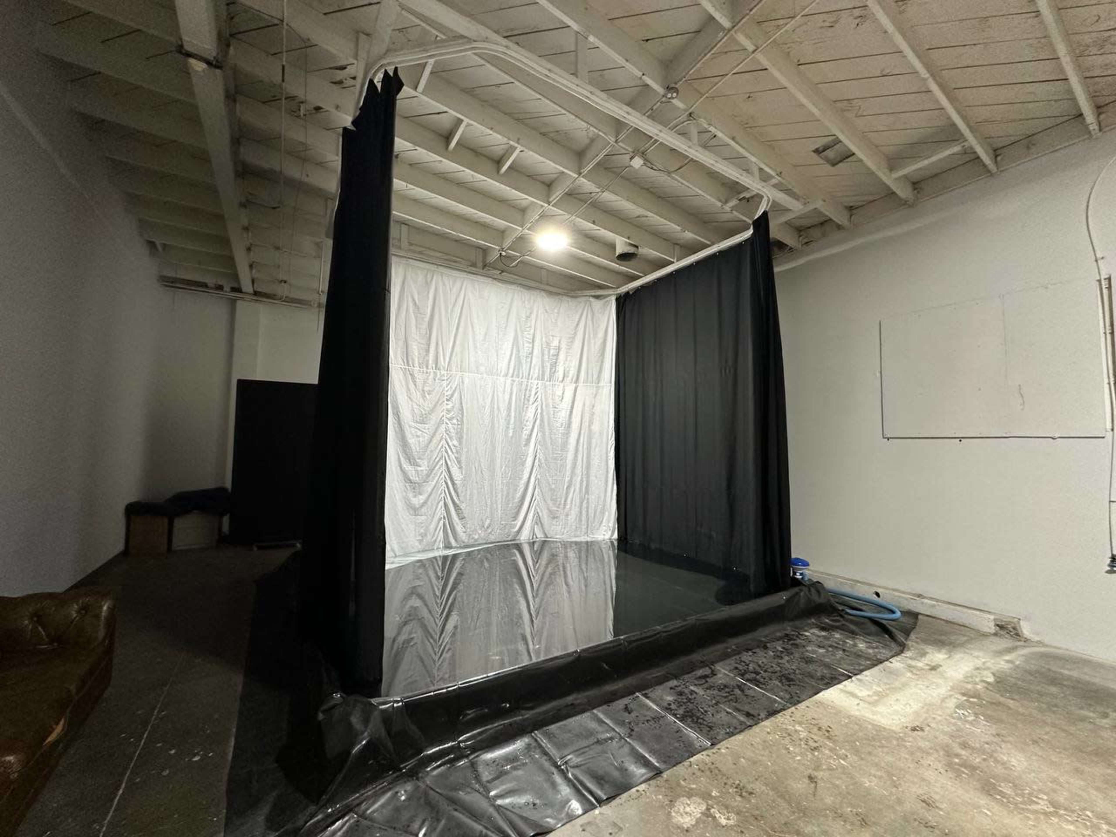 Large photo studio with white walls, leather couch and included ...