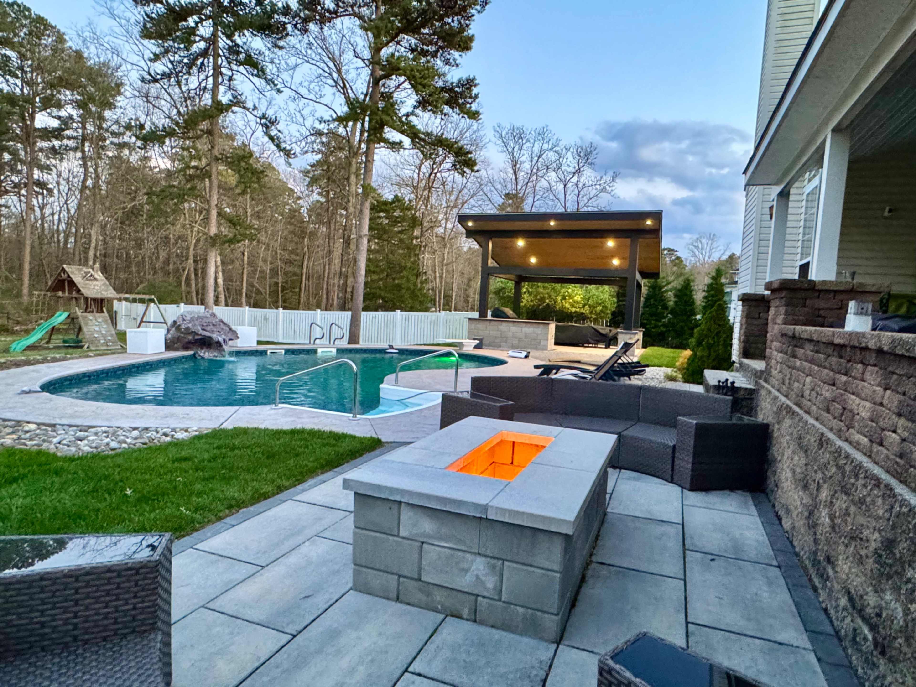 Versatile Luxury Home With Pool, Outdoor Kitchen, And Finished Basement ...