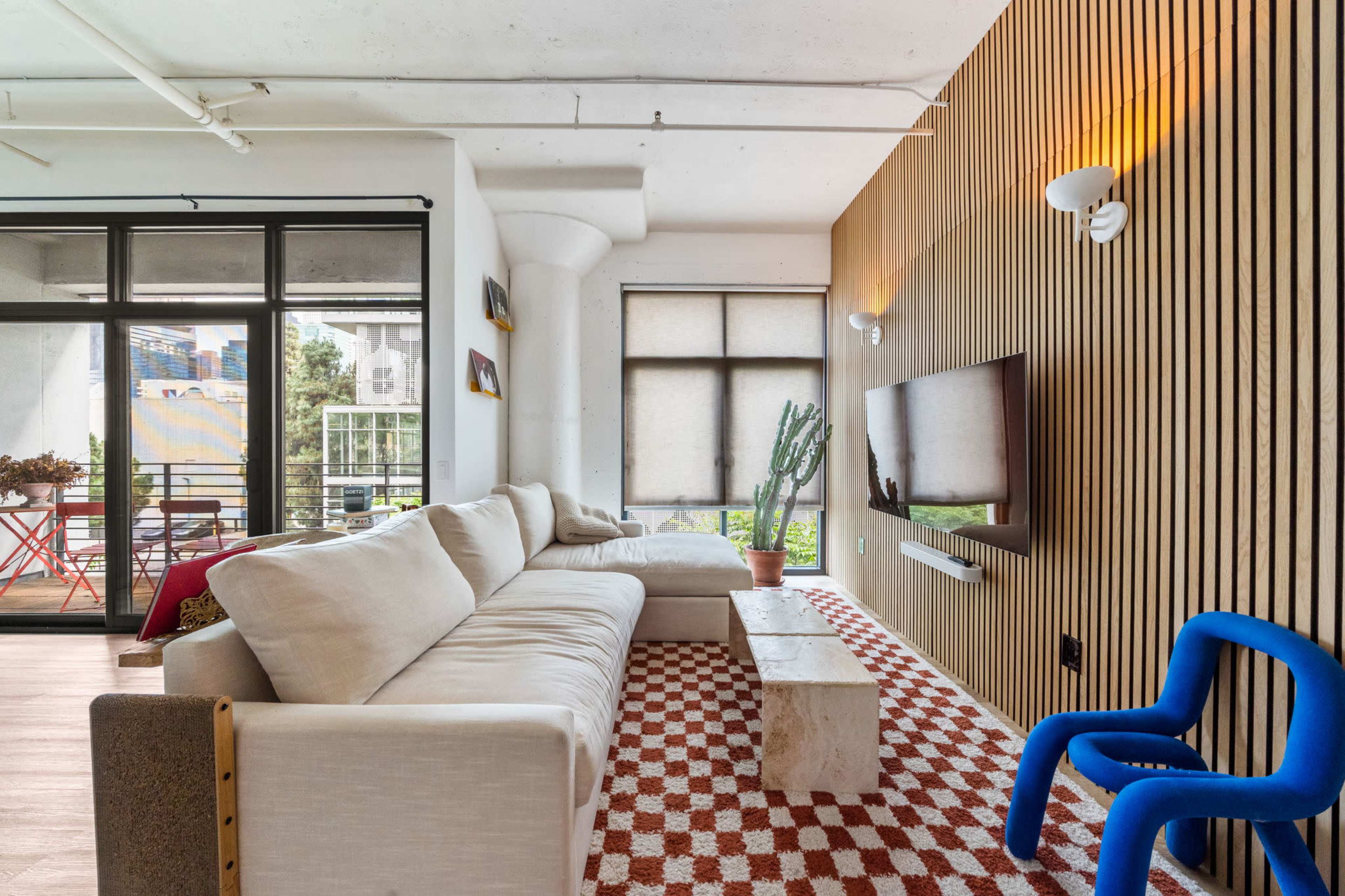 Vibrant Designer Loft with Funky Colors & Floor-to-Ceiling Windows in ...