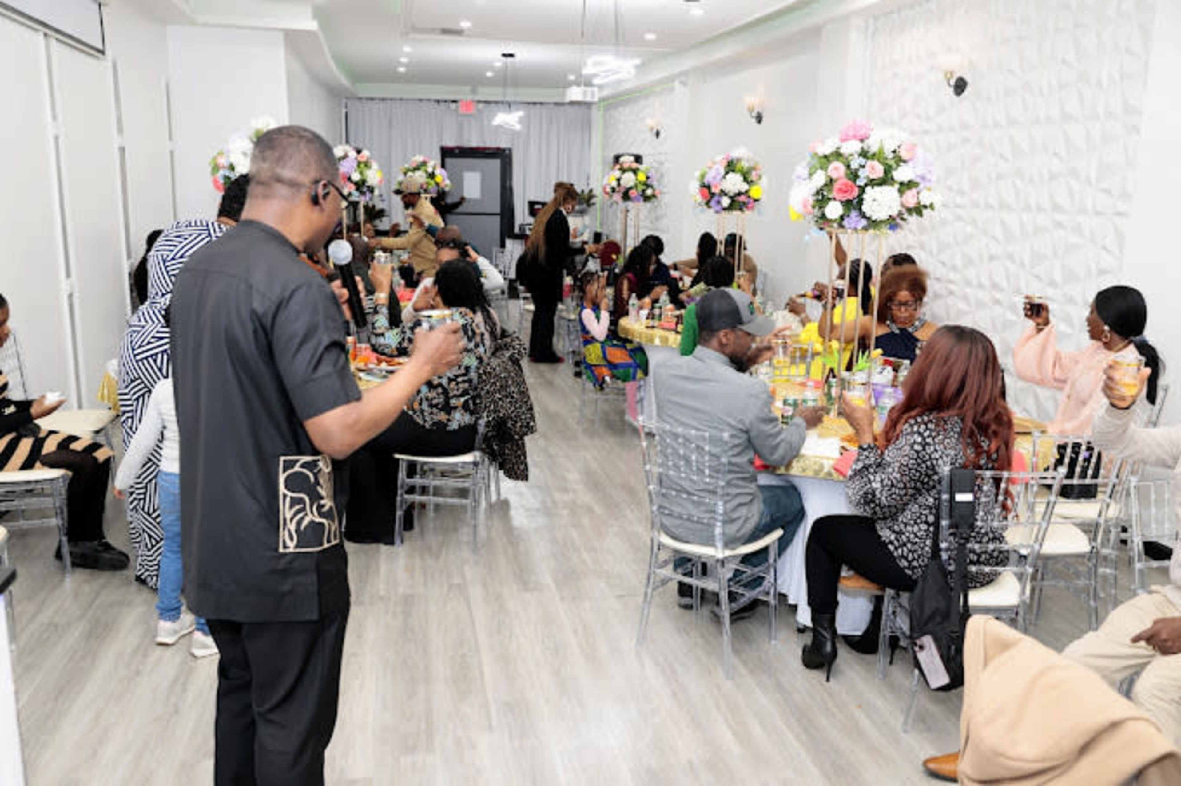 An all white sAtunning Premier Event Venue with Accent and Flower Walls ...