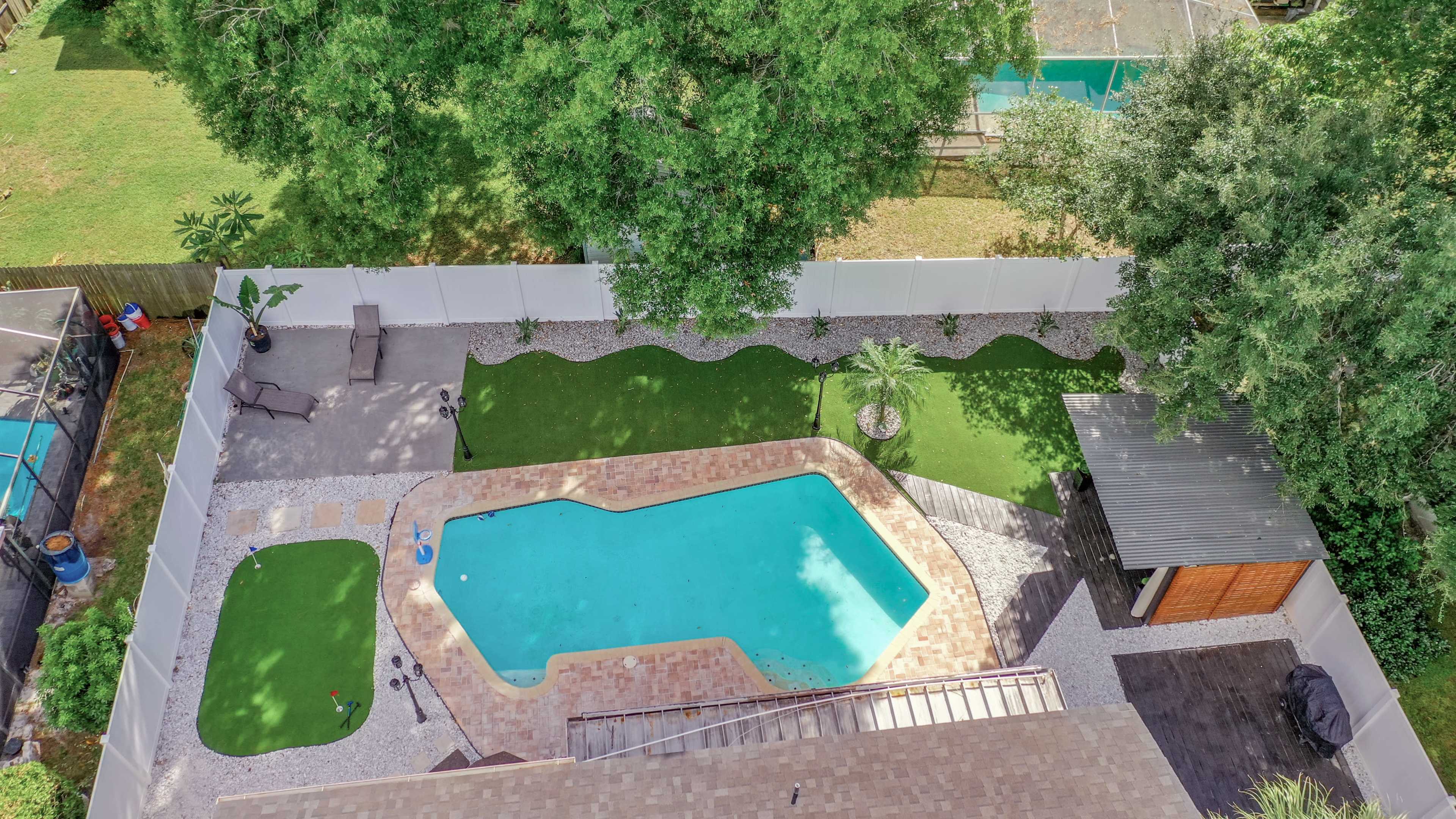 Sunny retreat pool and mini golf | The Luxe backyard escape, Tampa, FL | Event | Peerspace