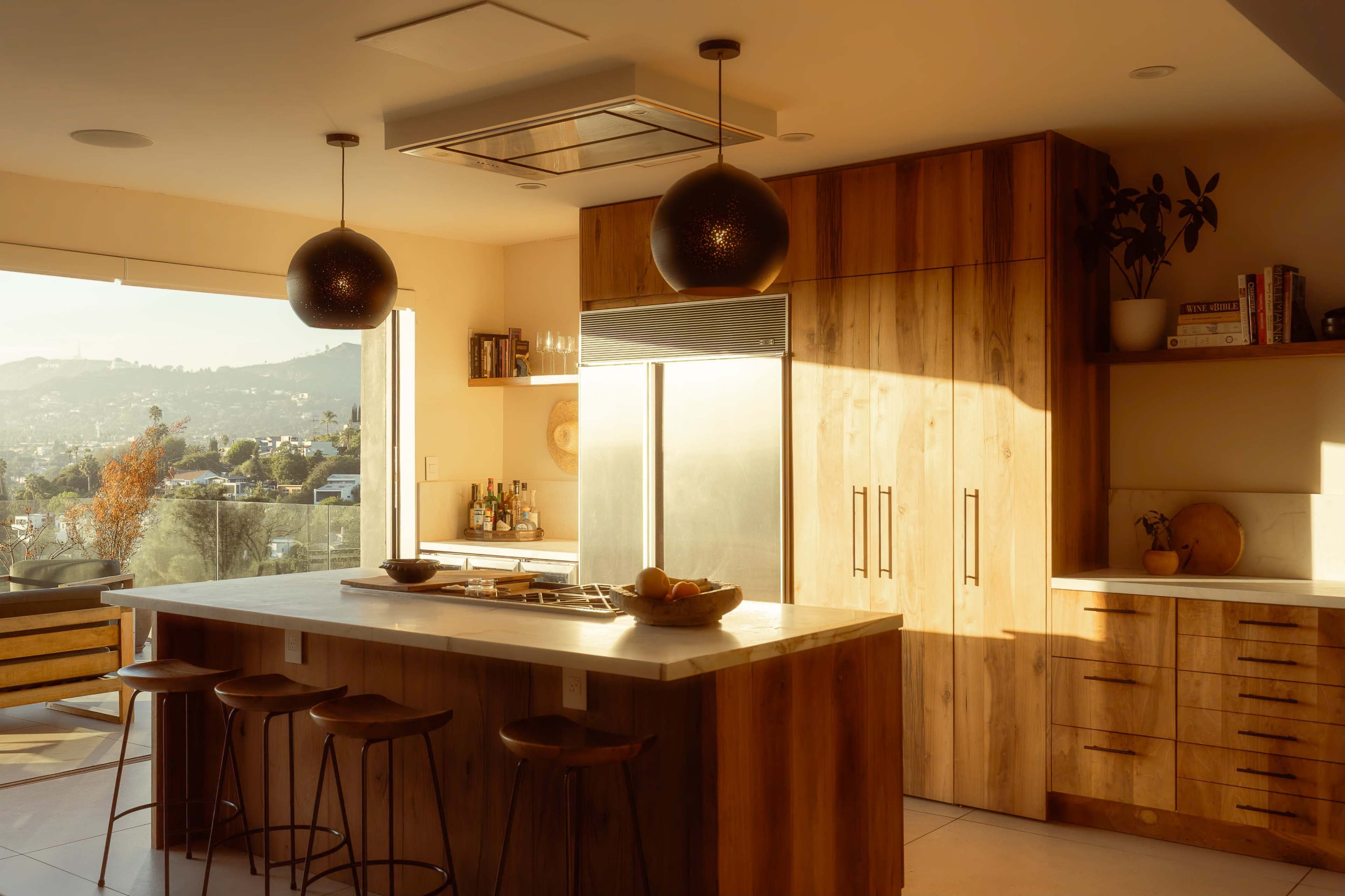 Hip view home. 30’ of bookshelves and open chef’s kitchen w/ stove in ...