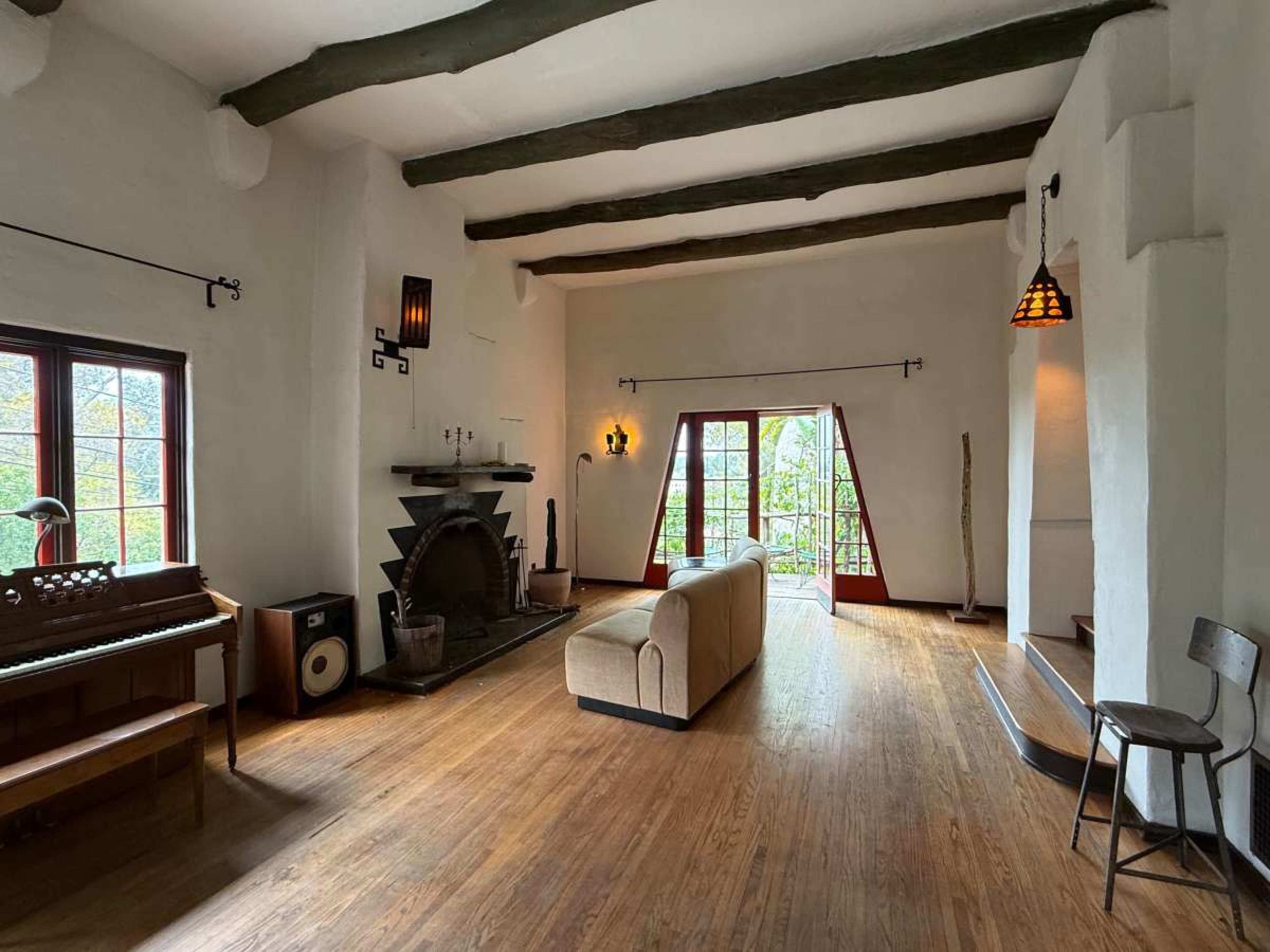 Unique Pueblo Mayan Revival House with high ceiling fireplace room, Los ...