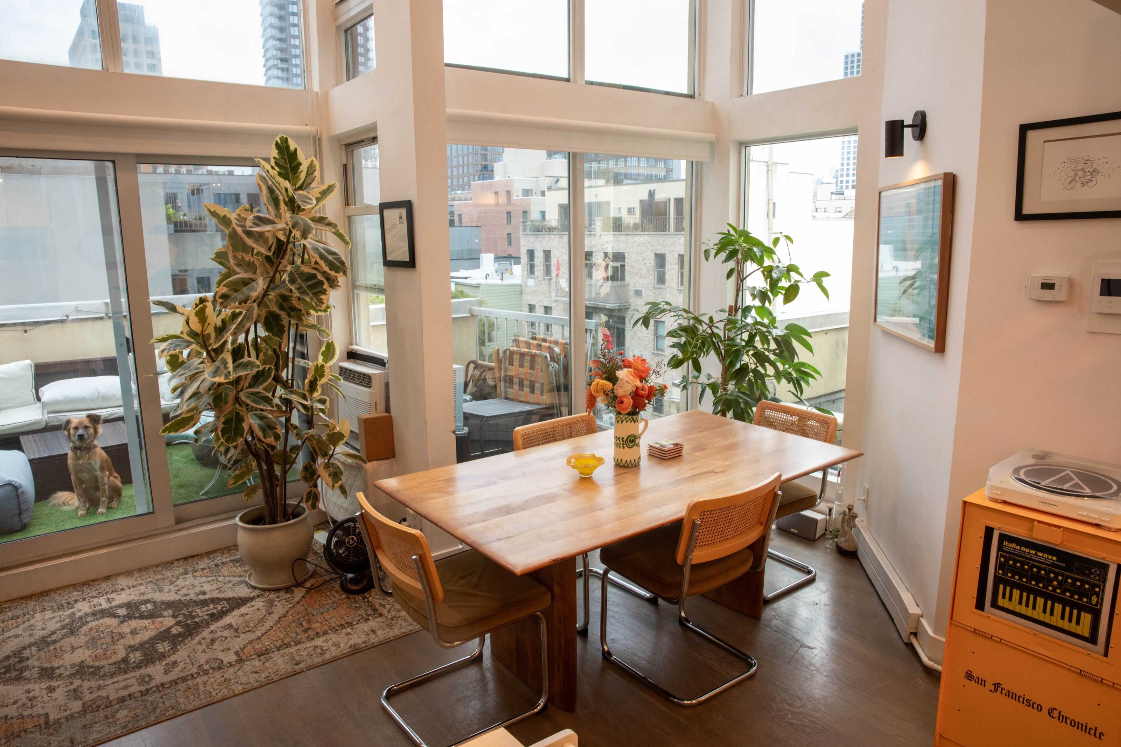 Eclectic Lofted Apartment with Floor-to-Ceiling Windows + Balcony ...