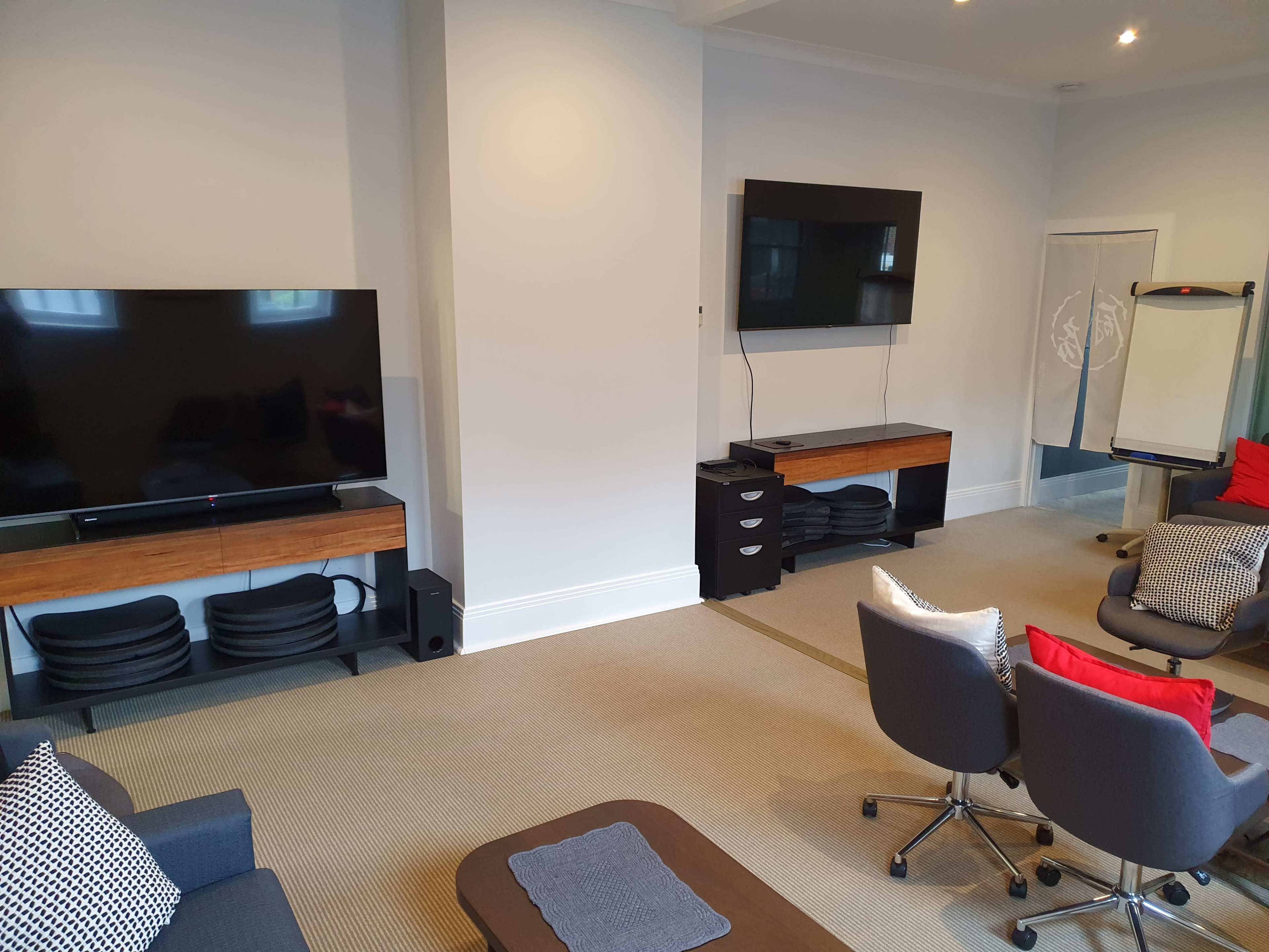 Comfortable lounge-style training/conference room, McKinnon | Off-Site ...