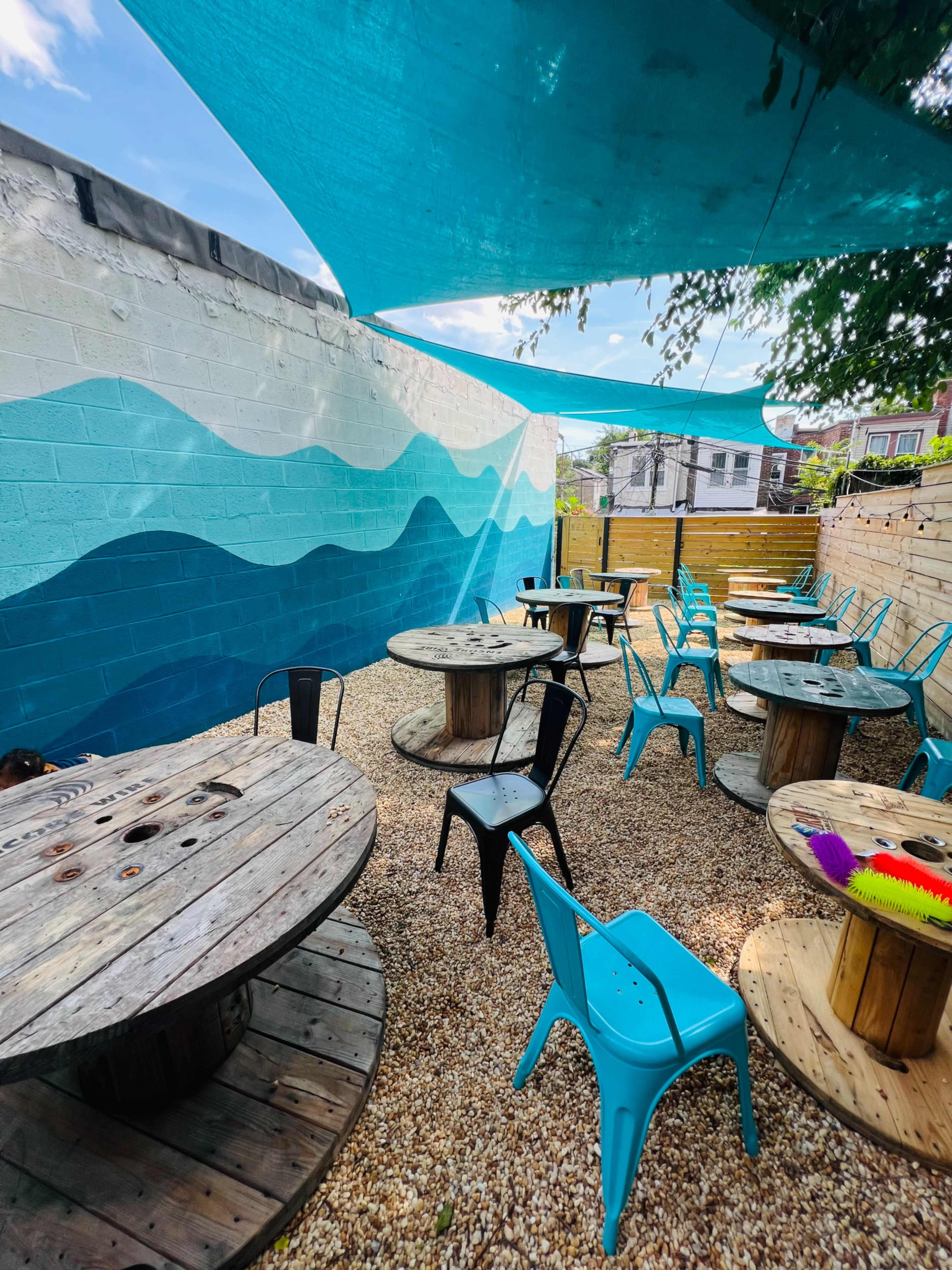 Wavy Open Air Event Space | Open-Air Space with Artistic Mural Wall ...